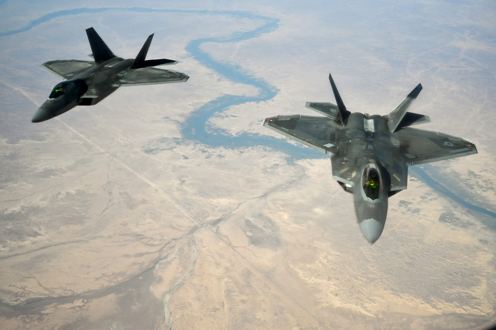 Air Force Arms F-22s With New Weapons, Changing Attack Tactics ...